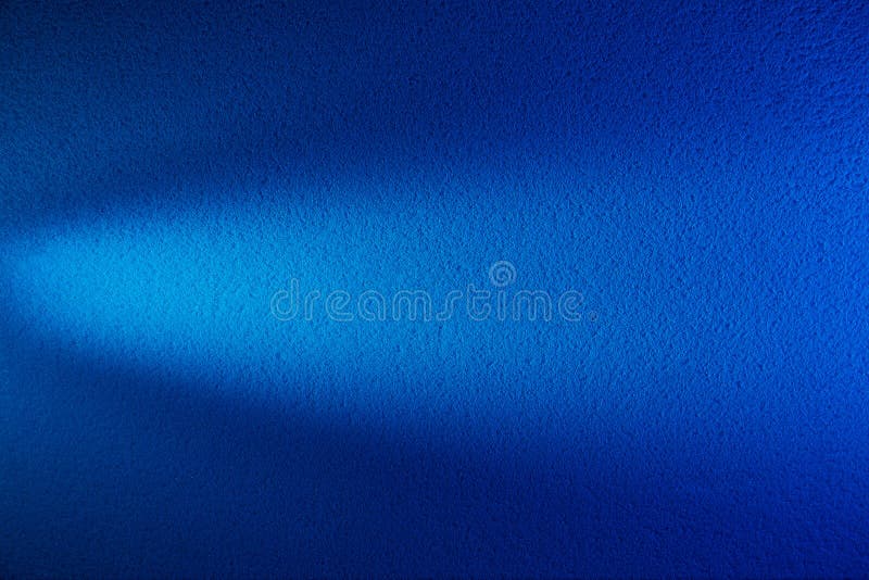 Cone-shaped Beam of Light on a Blue Textural Background Stock Image ...