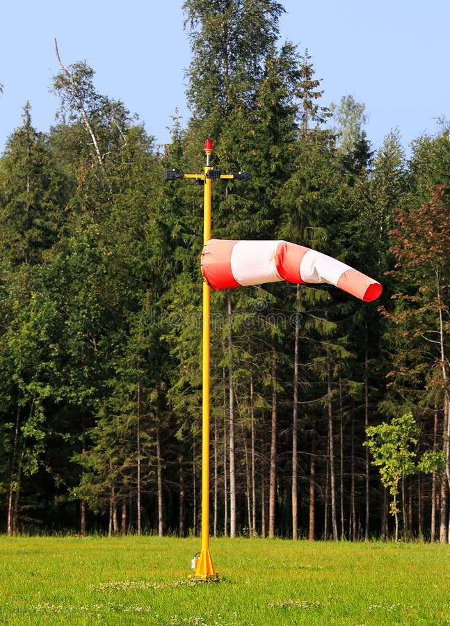 Cone-windsock on the Background of Trees Stock Photo - Image of storm ...
