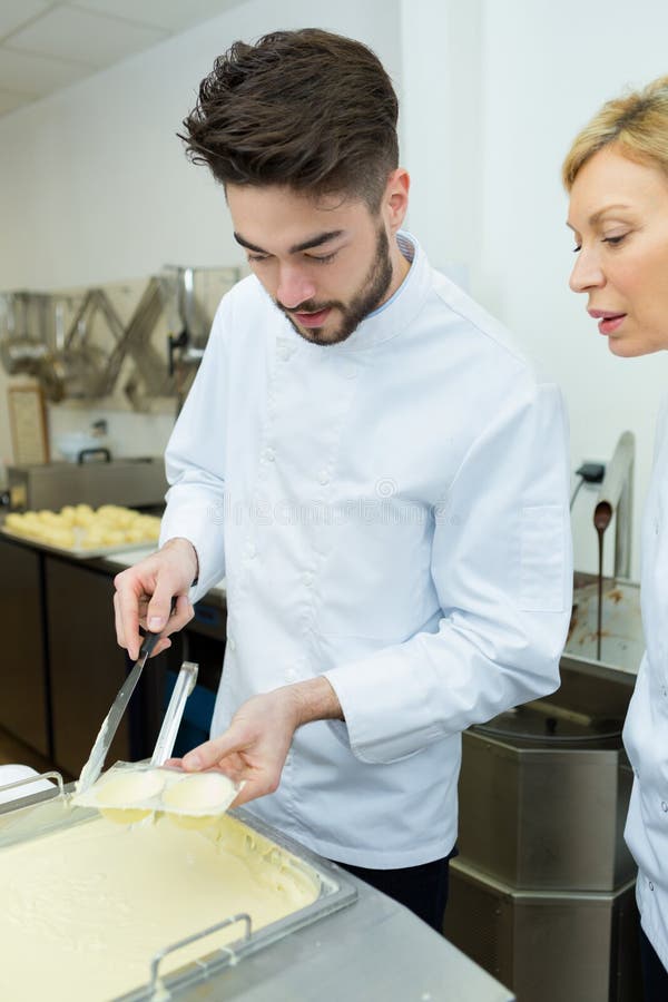 Confectioner Making White Chocolate Stock Image - Image of chef, chefs ...
