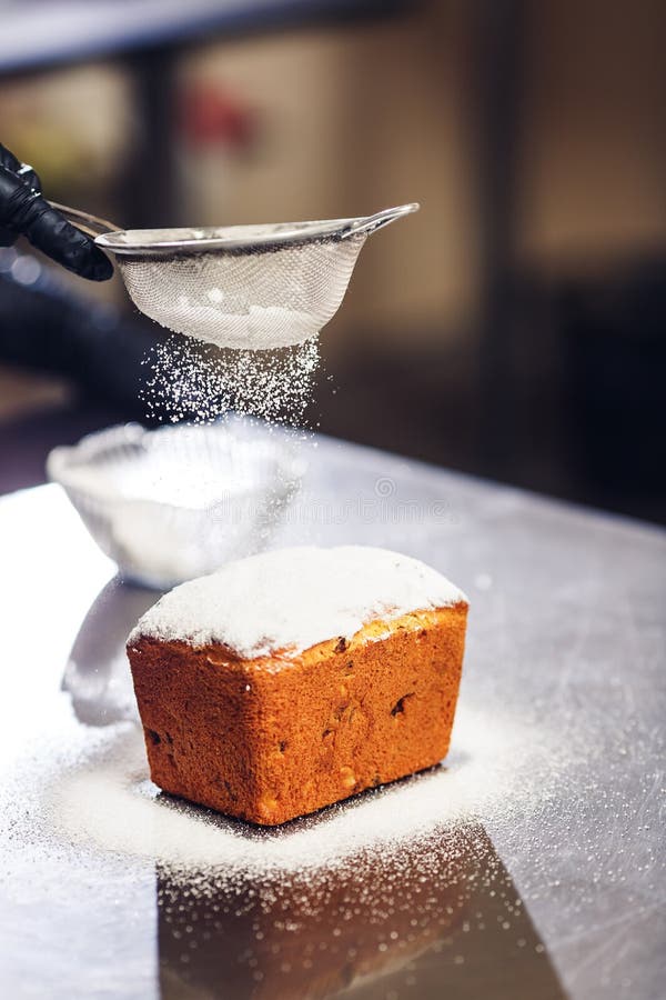 Confectioner Sprinkles Easter Cake with Icing Sugar through Sieve Stock ...
