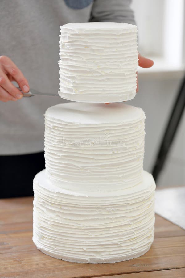Confectioner Stacking Layers White Naked Wedding Torte Cake Stock ...