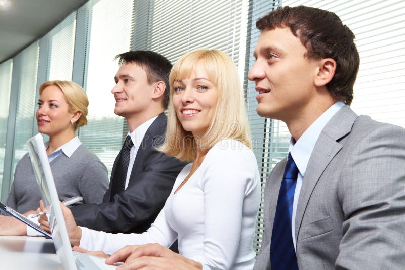 Four men at a seminar stock photo. Image of code, discussion - 2483570