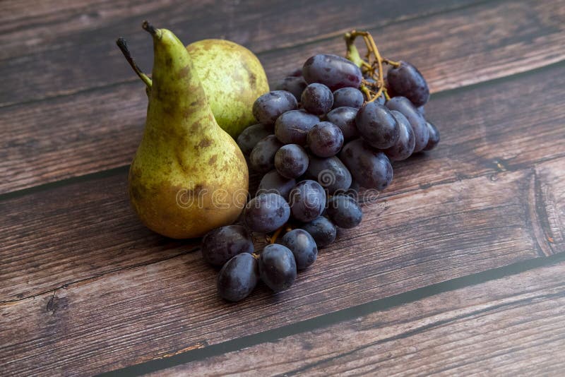 Conference Pear Also Known As Pyrus Communis and Seedless Red Grape on ...