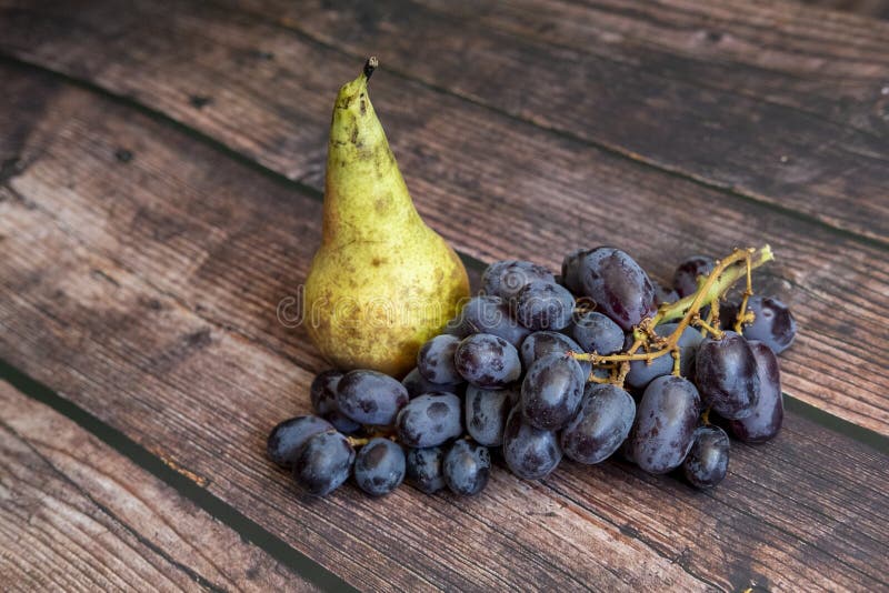 Conference Pear Also Known As Pyrus Communis and Seedless Red Grape on ...