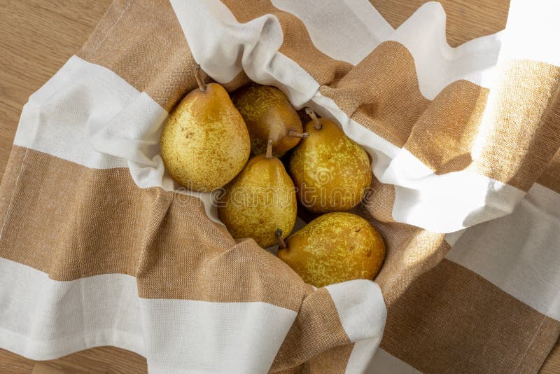 Conference Pears Inside a Container Covered by a White Stock Photo ...