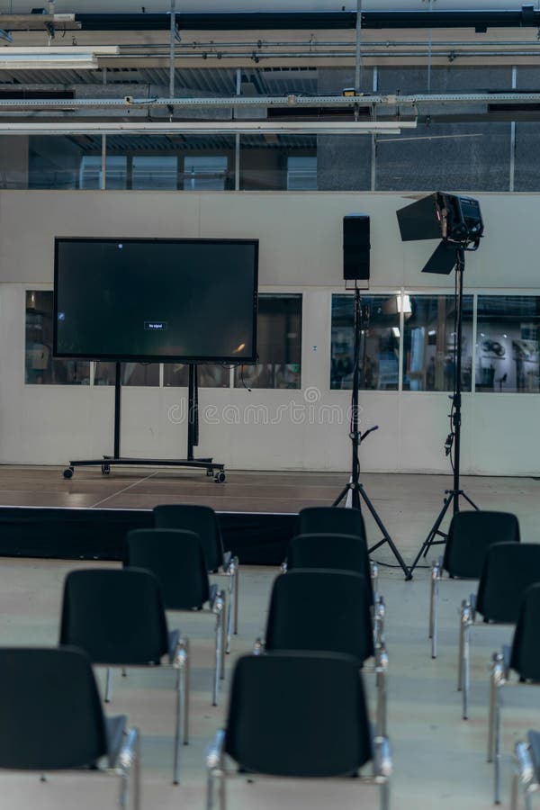 Conference Room with Empty Chairs and Small Stage Stock Image - Image ...