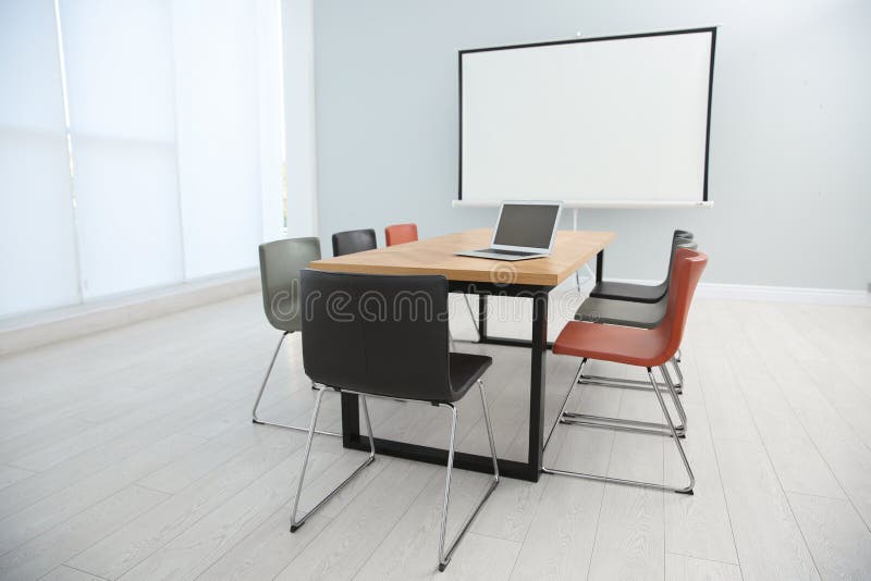 Conference Room Interior with Wooden Table and Video Projection Screen ...