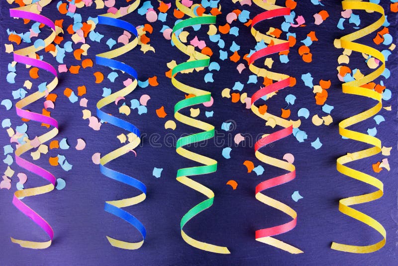 Confetti and Streamers on Slate Background Stock Image - Image of ...