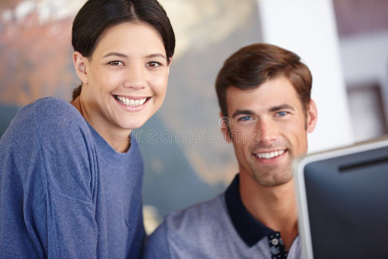 Confidence Conquers All. a Young Couple Using a Computer at Home. Stock ...