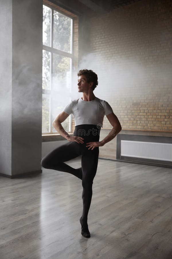 Male Dancer Practicing in Ballet Studio Holding Training Class Stock ...