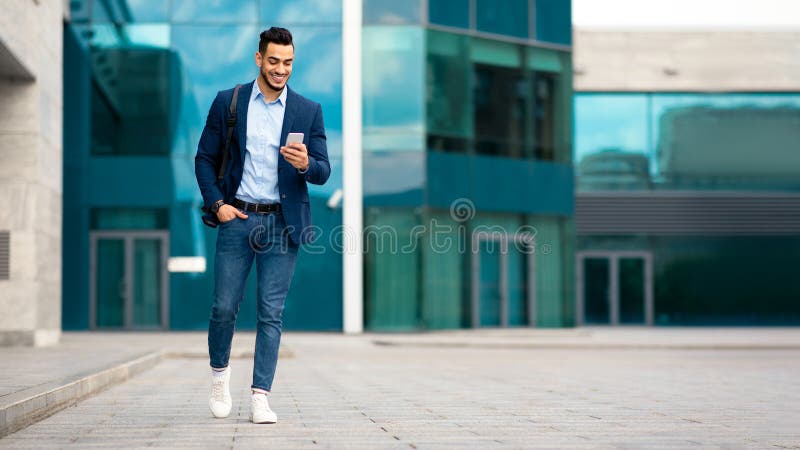 Confident Arabic Guy Programmer with Backpack Walking by Street Stock ...