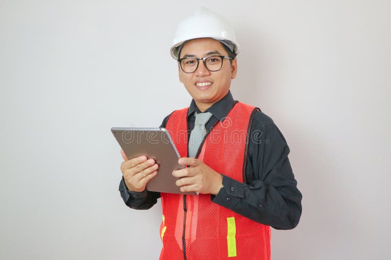 Confident Asian Engineer Man Using Tablet for Checking and Maintenance ...