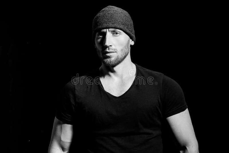 Confident Attractive Man with Serious Face on Black. Stock Photo ...