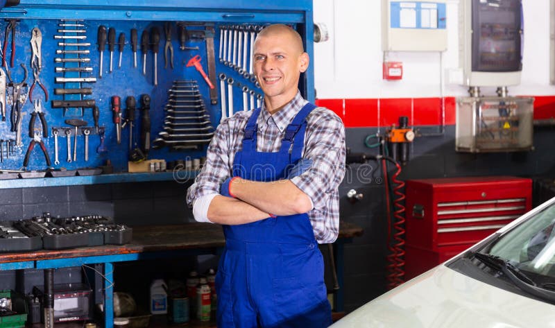 Professional Auto Mechanic Posing in Workshop Stock Image - Image of ...