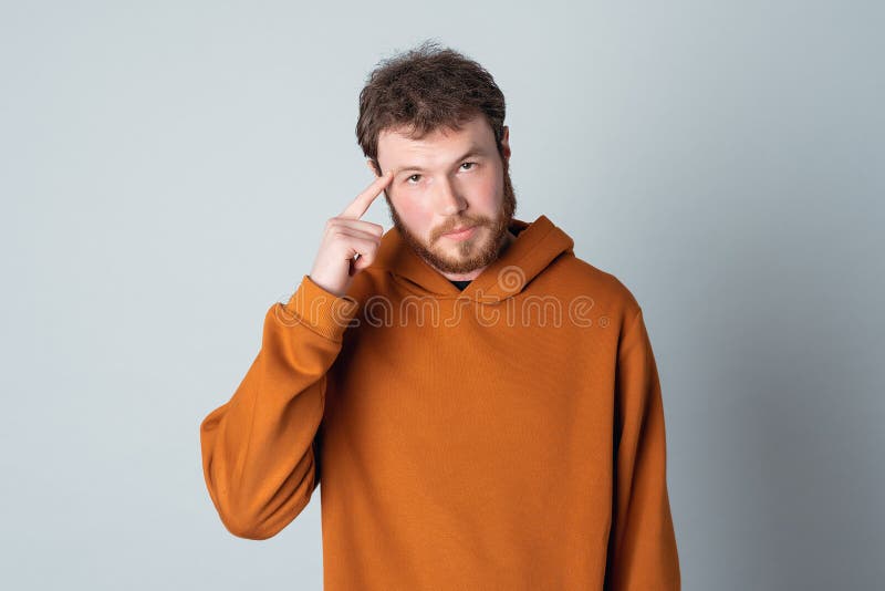 541 Pointing Finger Against Head Stock Photos - Free & Royalty-Free ...