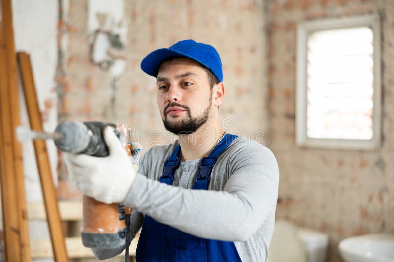 Confident Builder Posing on Indoor Construction Site Stock Image ...