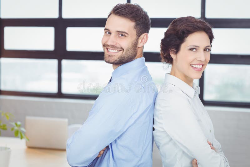 Confident Business People Standing Back To Back Stock Photo - Image of ...