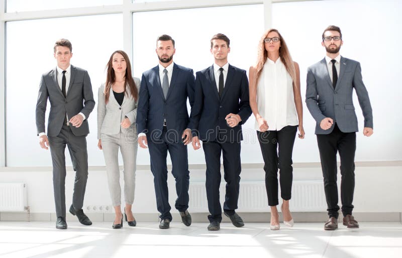 Confident Business Team Stepping Forward. Stock Image - Image of hall ...