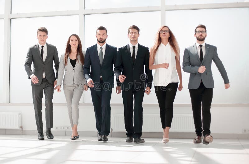 Confident Business Team Stepping Forward. Stock Photo - Image of ...