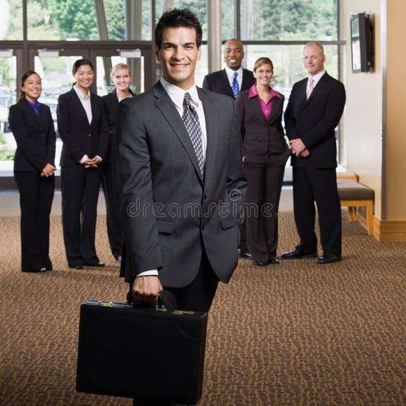 Confident Businessman Holding Briefcase Stock Photo - Image of partner ...
