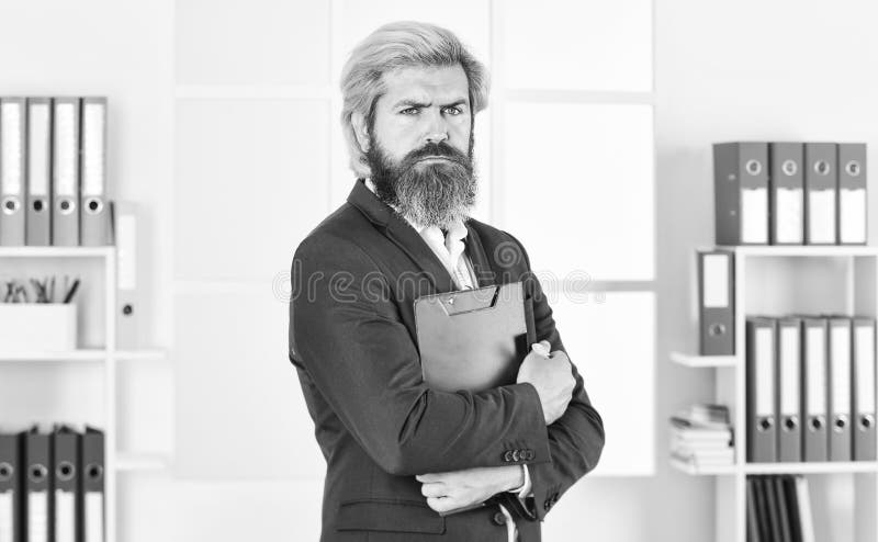 Confident Businessman Holding Documents. Businessman with Folder ...