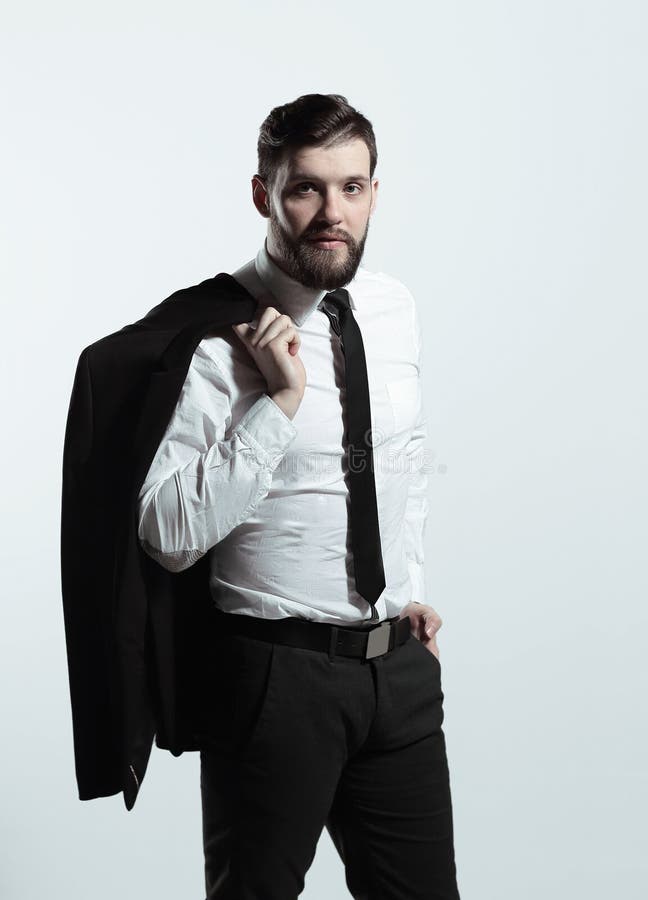 Confident Businessman Holding a Jacket Over His Shoulder Stock Photo ... Confident Businessman Holding a Jacket Over His Shoulder Stock Photo ...