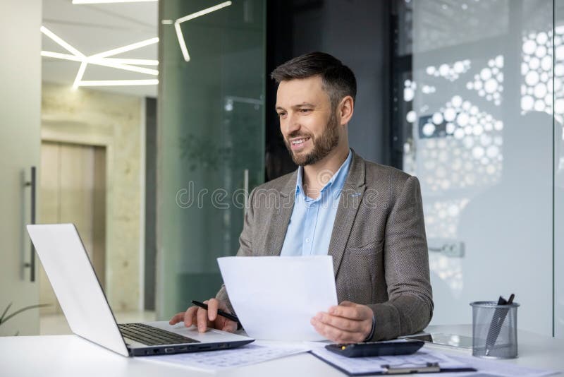 Confident Businessman Working in Modern Office with Laptop and ...