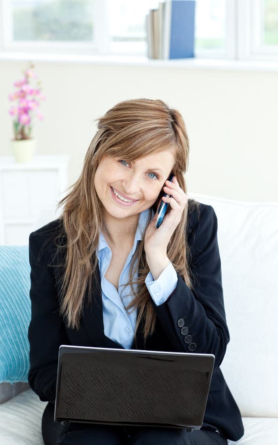 Confident Businesswoman Using a Mobile Phone Stock Image - Image of ...