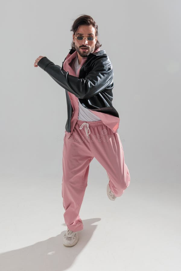 Confident Casual Guy in Black Leather Jacket Running and Being Dynamic ...