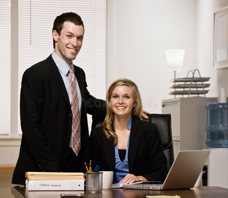 Co-workers Posing in Office Stock Image - Image of person, adult: 6580665