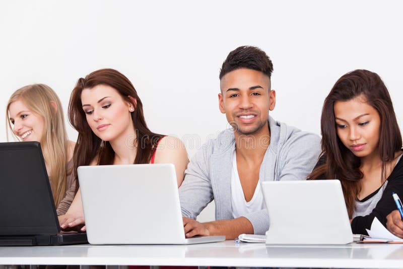 Confident College Students Standing Together in Classroom Stock Image ...