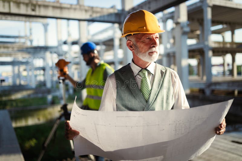 Confident Construction Engineer, Architect, Businessman in Hardhat on ...