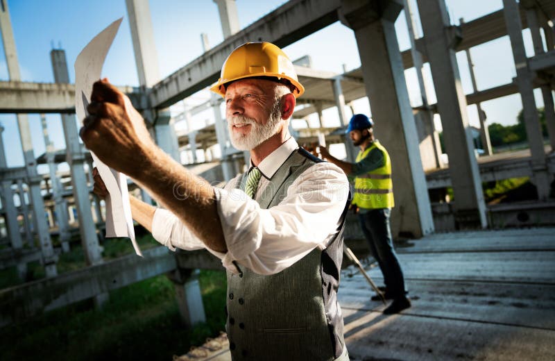 Confident Construction Engineer, Architect, Businessman in Hardhat ...