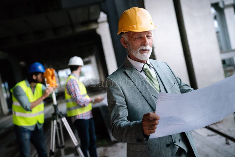 Confident Construction Engineer, Architect, Businessman in Hardhat ...