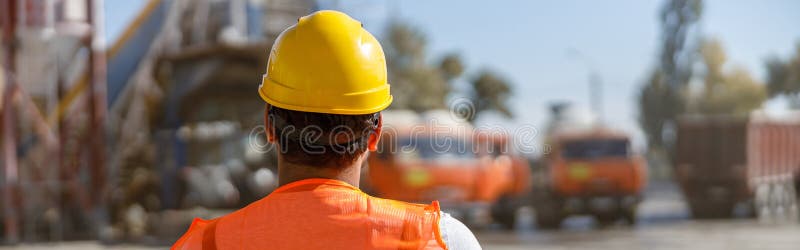 Confident Construction Worker Controlling Production Process Outdoors ...