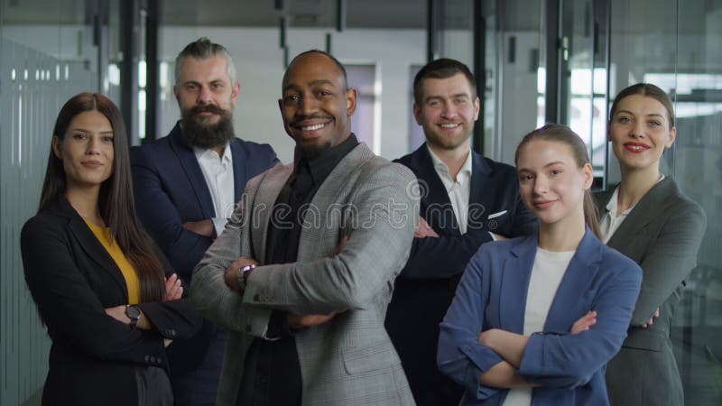 Confident and Diverse Group of Business Professionals Standing Together ...