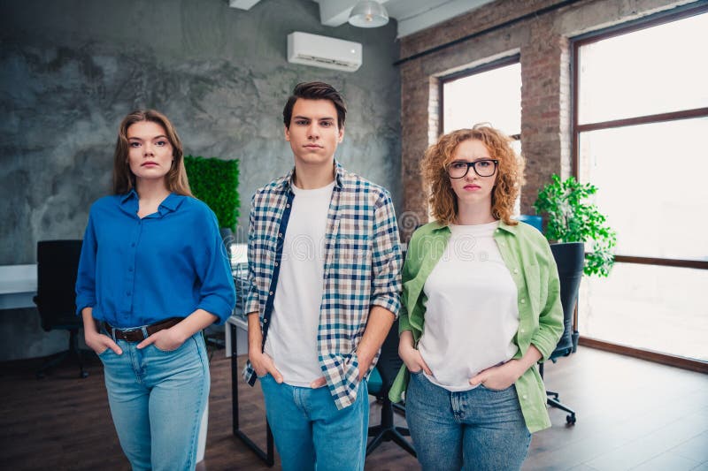 Confident Diverse Group of Young Professionals Standing Together in a ...