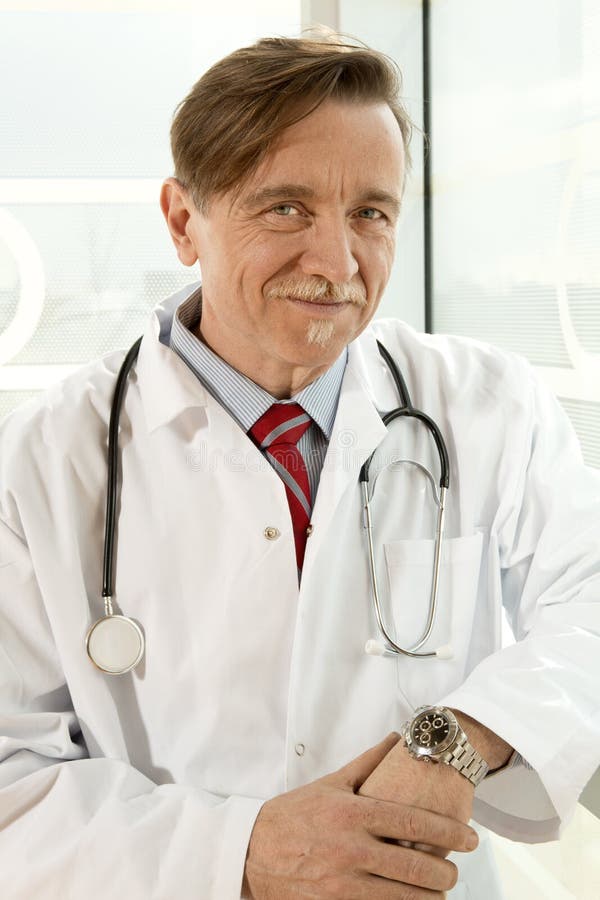 Confident doctor stock image. Image of competence, arms - 19574079