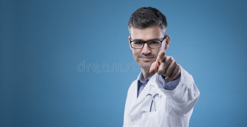 Confident doctor pointing stock image. Image of occupation - 49883843