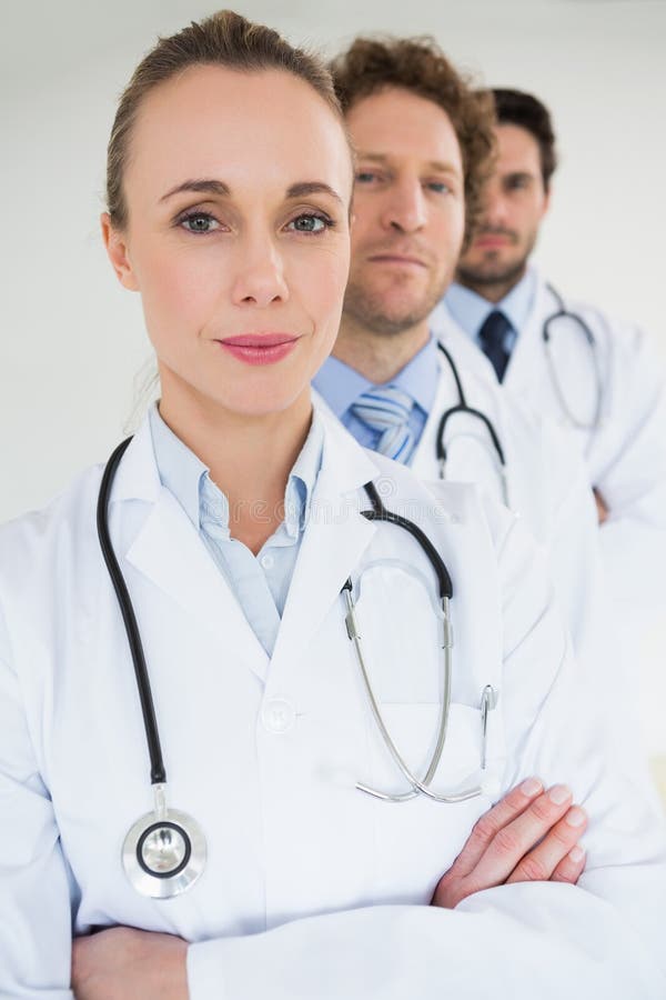 Confident Doctors Standing in a Row Stock Image - Image of adult ...