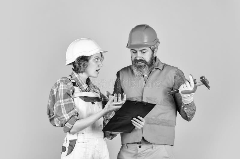 Confident Electrical and Technician. Engineers Couple Working Together ...