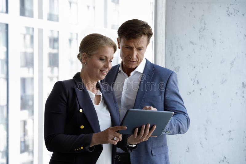 Confident Engaged Boss Instructing Employee, Telling about Task Stock ...