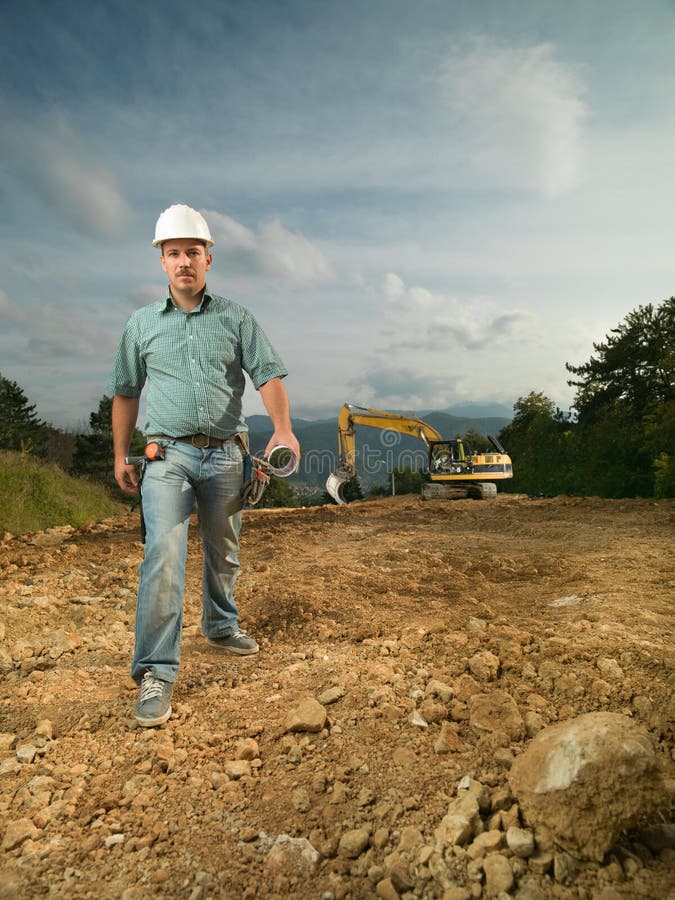 Engineer Walking on Construction Site Stock Image - Image of blueprint ...
