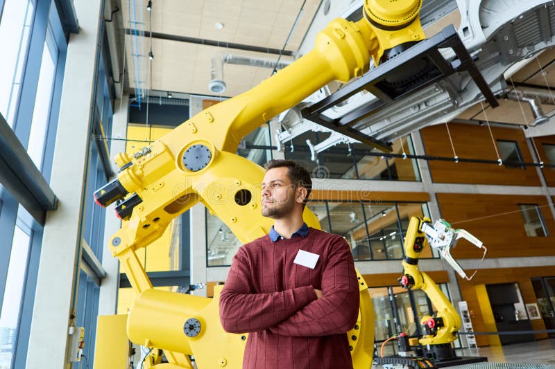 Engineer Standing Front Large Robotic Arm Industrial Setting Stock ... Engineer Standing Front Large Robotic Arm Industrial Setting Stock ...