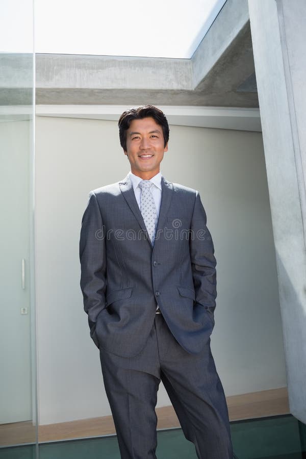 Confident Estate Agent Standing at Front Door Stock Image - Image of ...