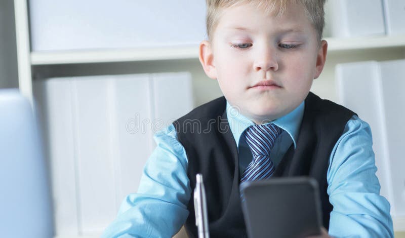Confident Executive Boss Boy Making Notes Sitting at the Desk with ...