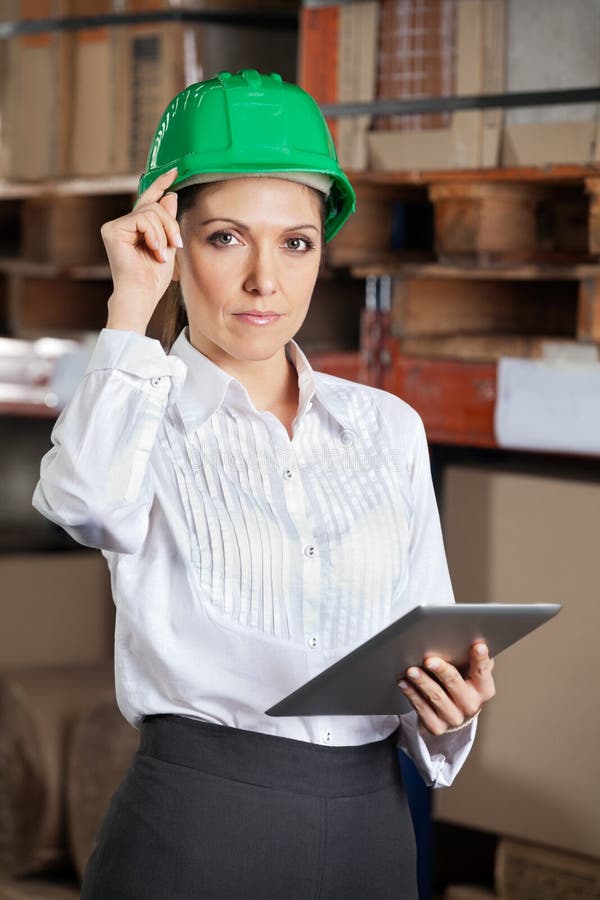 Confident Female Supervisor with Digital Tablet at Stock Photo - Image ...