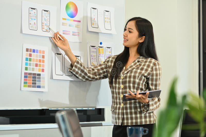 Confident Female UX Designer Presenting Sketch Designs, Application ...