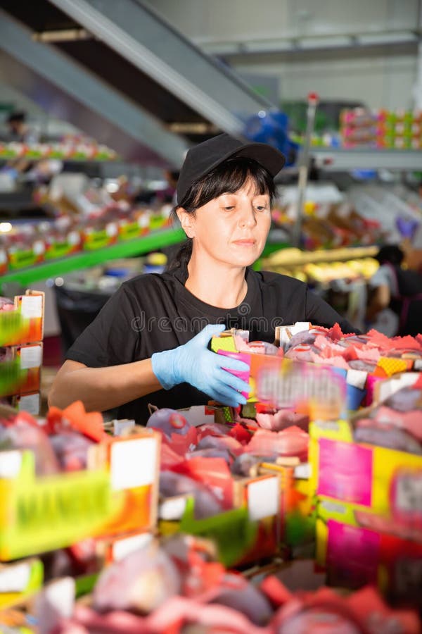 Confident Female Working with Mango at Sorting Department at Fruits ...