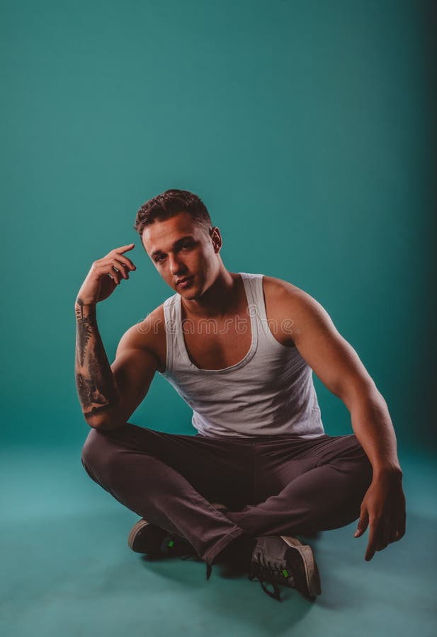 A Fit, Confident Athlete, Flexing Muscles, Showcasing Transformation ...